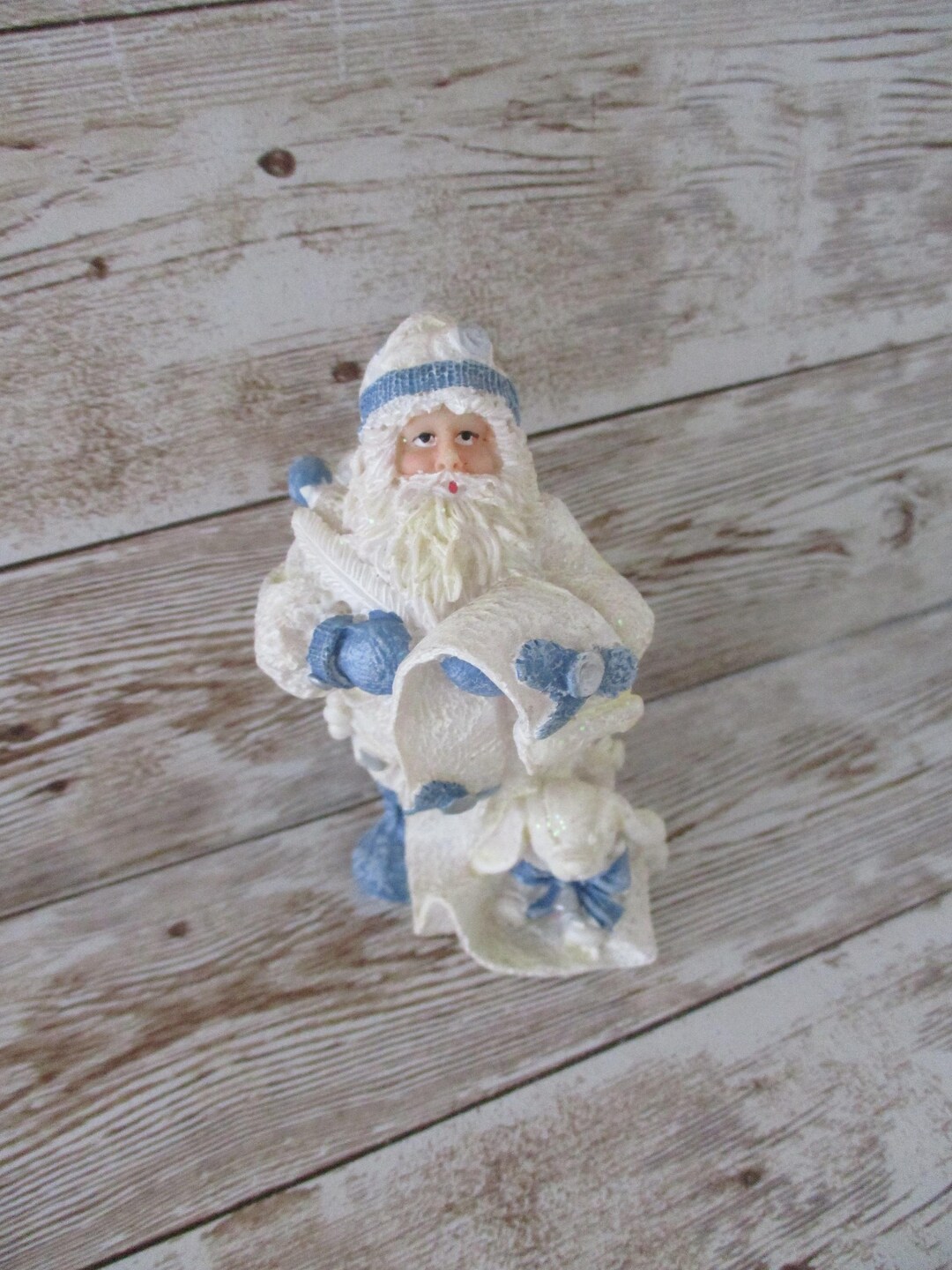 Vintage Santa Claus Resin Figurine Blue and off White Holding Naughty ...