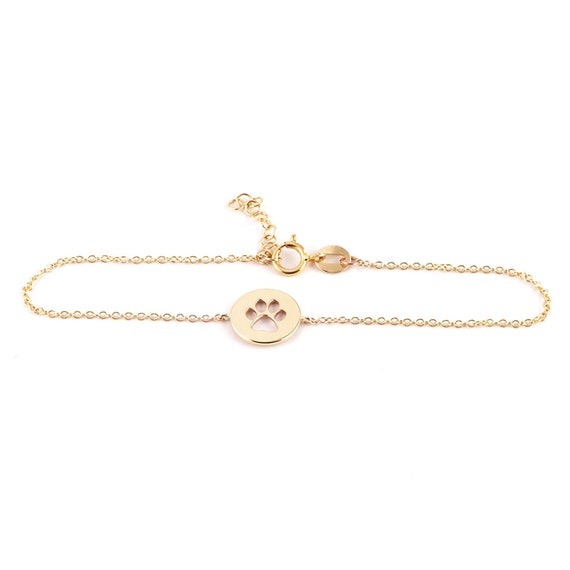 Gold paw print bracelet store
