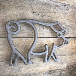 Cast Iron Pig Trivet. Cast Iron Pig Shown in the Aged Iron Finish. Use ...