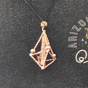 The Nugiza Personal Harmoniser EMF Protection Pendant , Tensor Rings ...