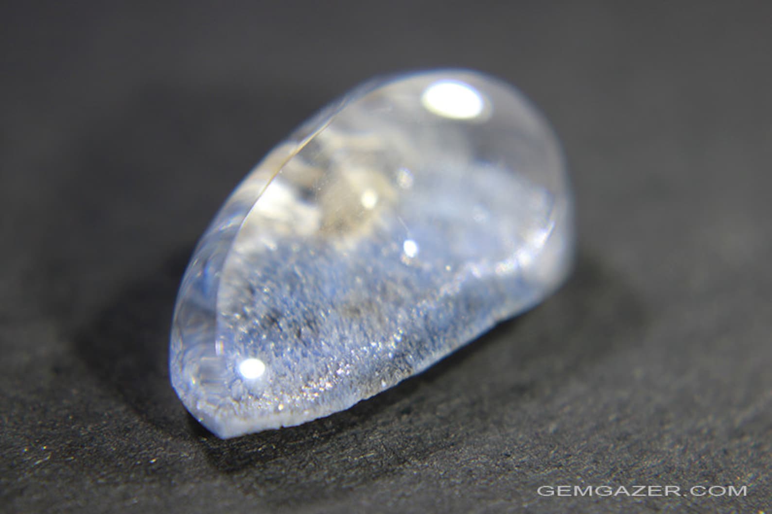 Quartz Cabochon With Blue Dumortierite Crystal Inclusions, Brazil. 16. ...