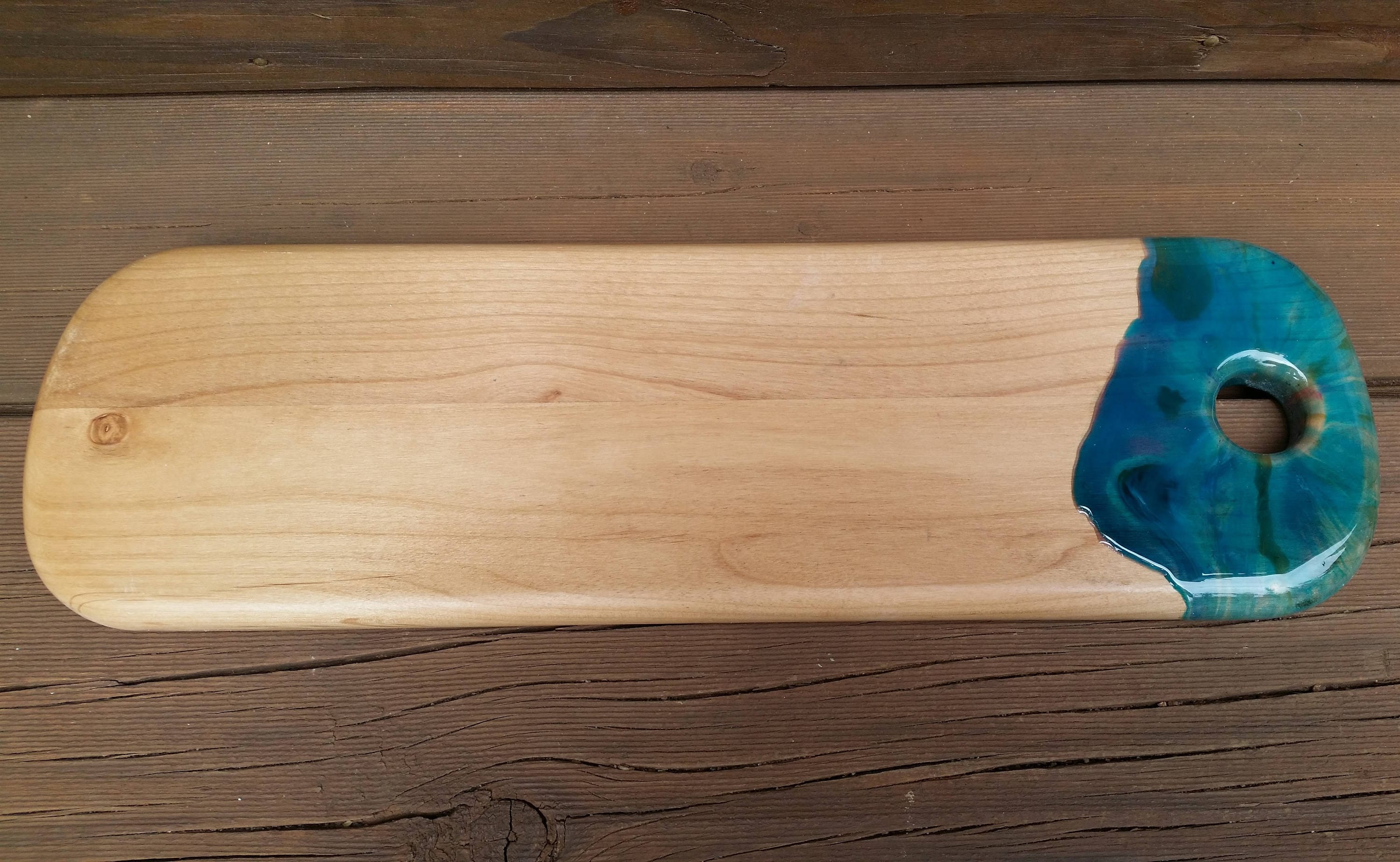 Timber serving board customised with resin artwork