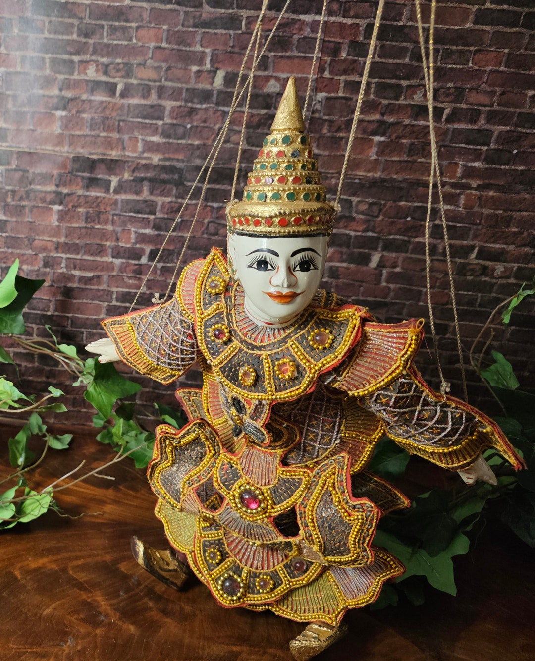 Older Asian Marionette in Traditional Head Dress and Beaded Outfit. in ...