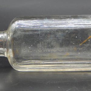 2 ANTIQUE JOHNSONS BOTTLES 1 Blue and 1 Clear Glass Medicine Bottle ...