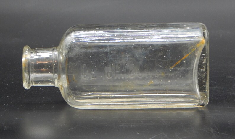 2 ANTIQUE JOHNSONS BOTTLES 1 Blue and 1 Clear Glass Medicine Bottle ...