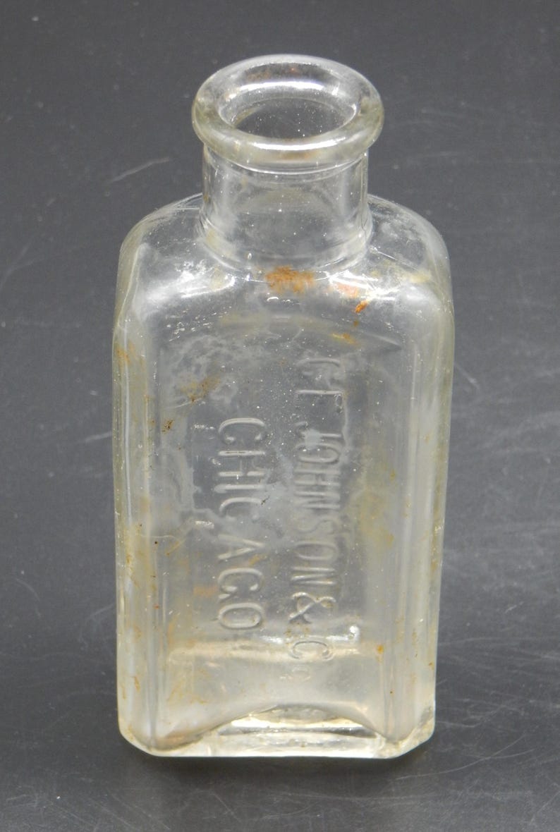 2 ANTIQUE JOHNSONS BOTTLES 1 Blue and 1 Clear Glass Medicine Bottle ...