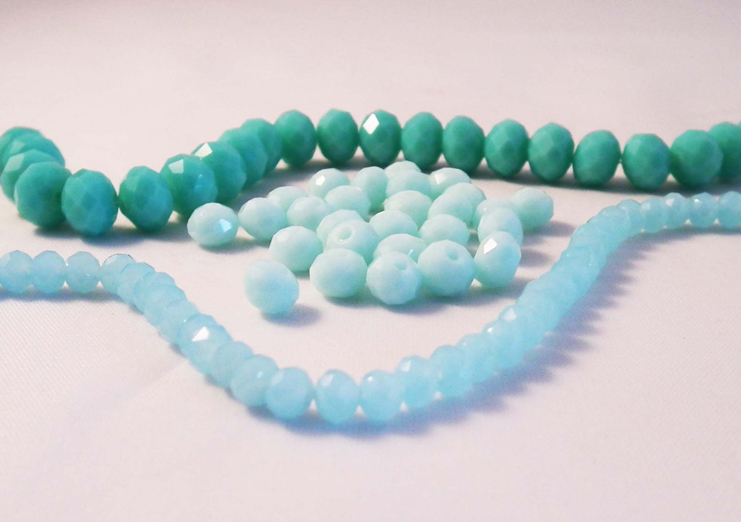 PU05 Perlas preciosas en cristal redondeado con facetas mixtas de color ...