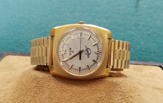 Elgin Swisssonic Electric Mechanical Watch - Gem