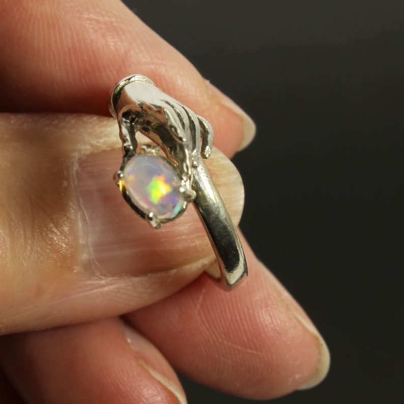 Opal Silver Ring Hand Holding Natural Opal Gemstone Sterling Silver ...