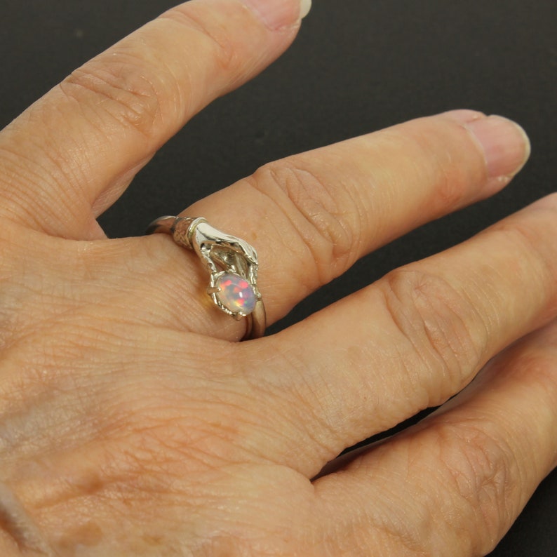 Opal Silver Ring Hand Holding Natural Opal Gemstone Sterling Silver ...