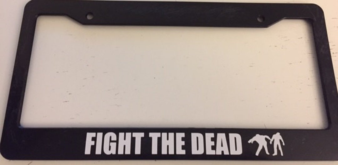 Fight the Dead With Zombie Image - Black Automotive License Plate Frame ...