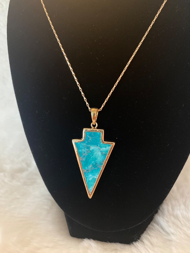 Real Aqua / Turquoise Colored Stone Arrowhead Pendant With Gold Accents ...