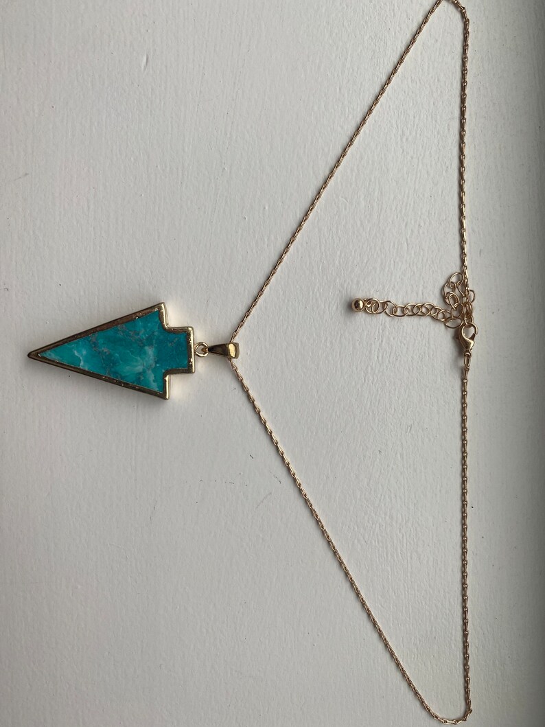 Real Aqua / Turquoise Colored Stone Arrowhead Pendant With Gold Accents ...