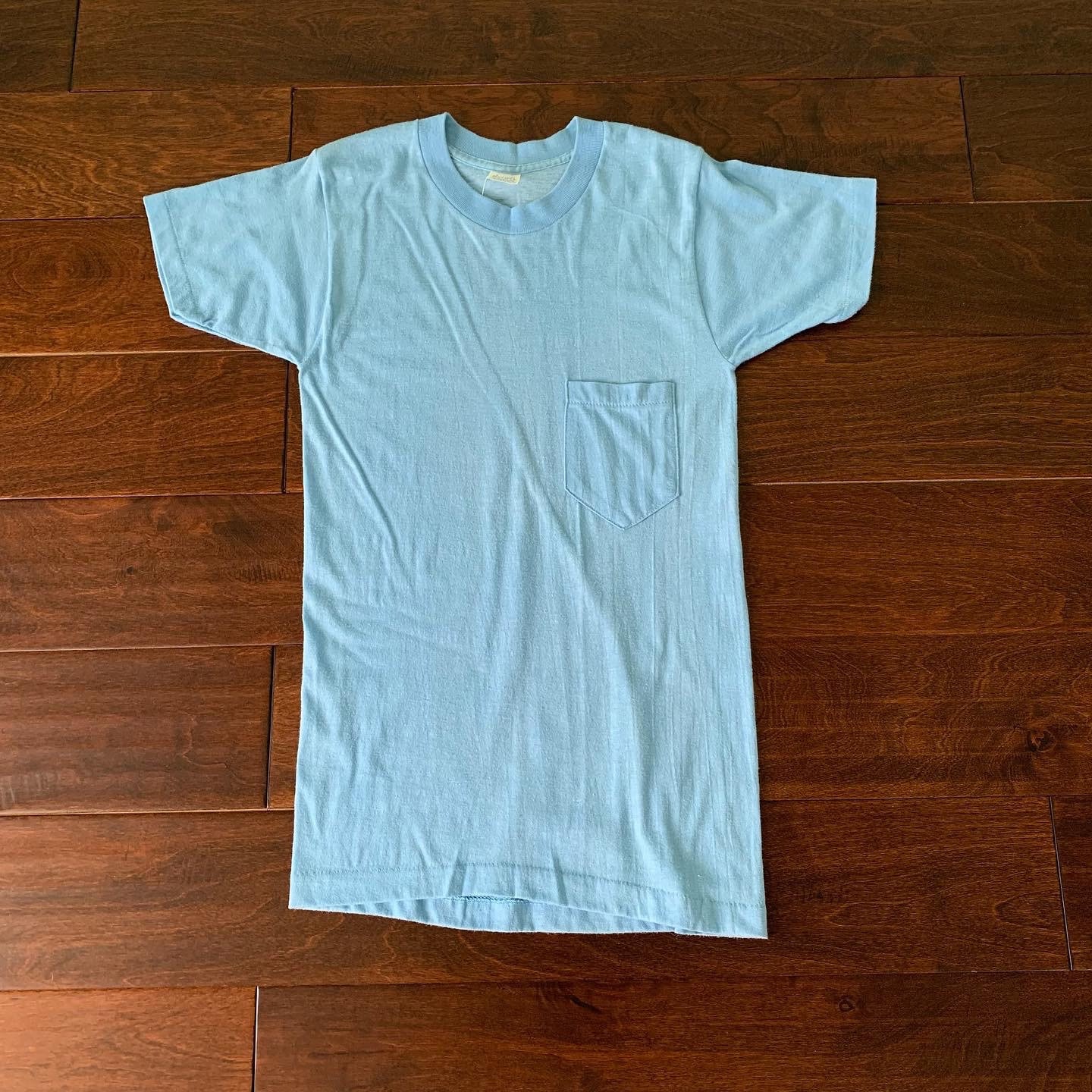 Vintage 1970s deadstock blue blank pocket tees, small, large