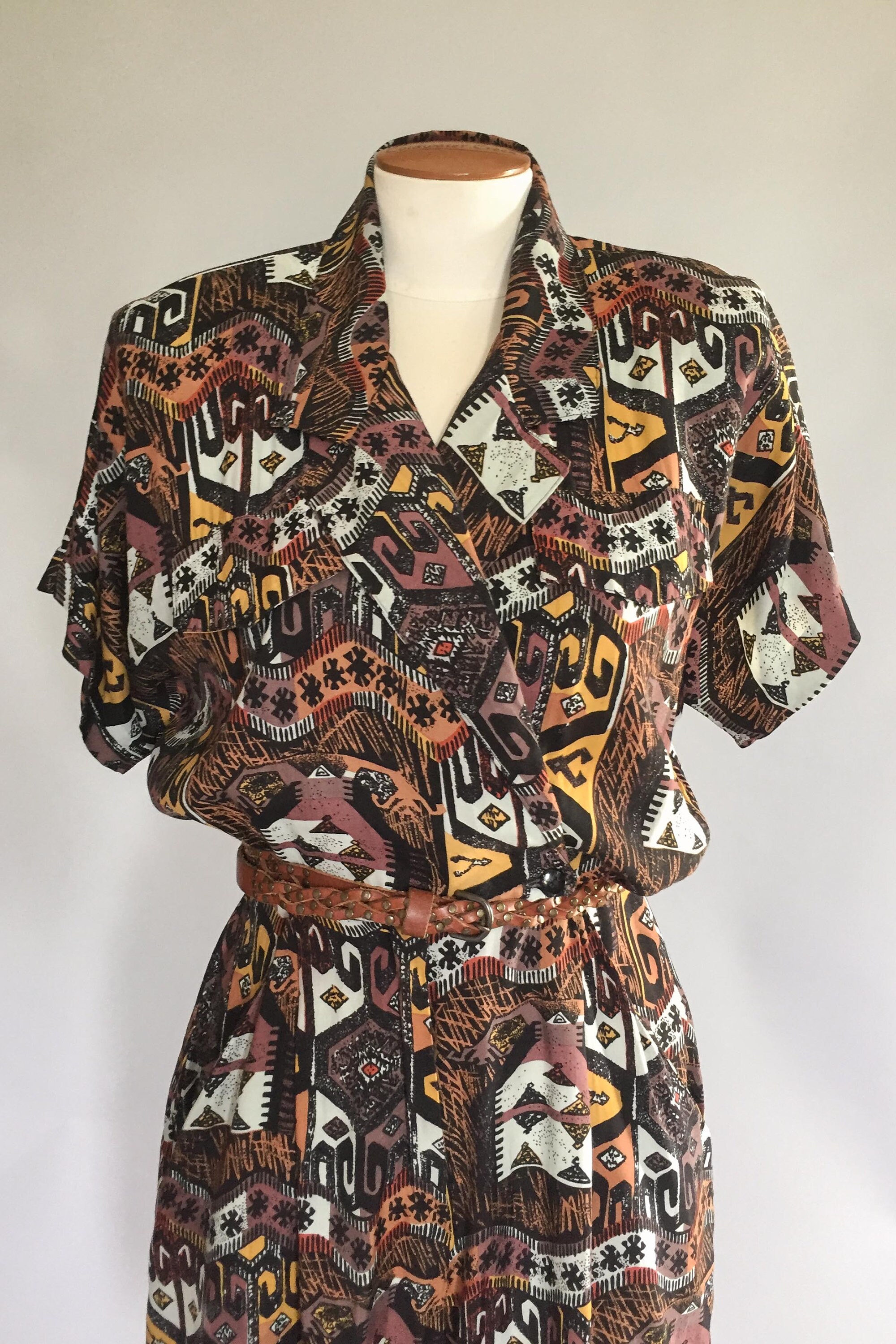 Vintage 1980s brown and black abstract print rayon short sleeved romper ...