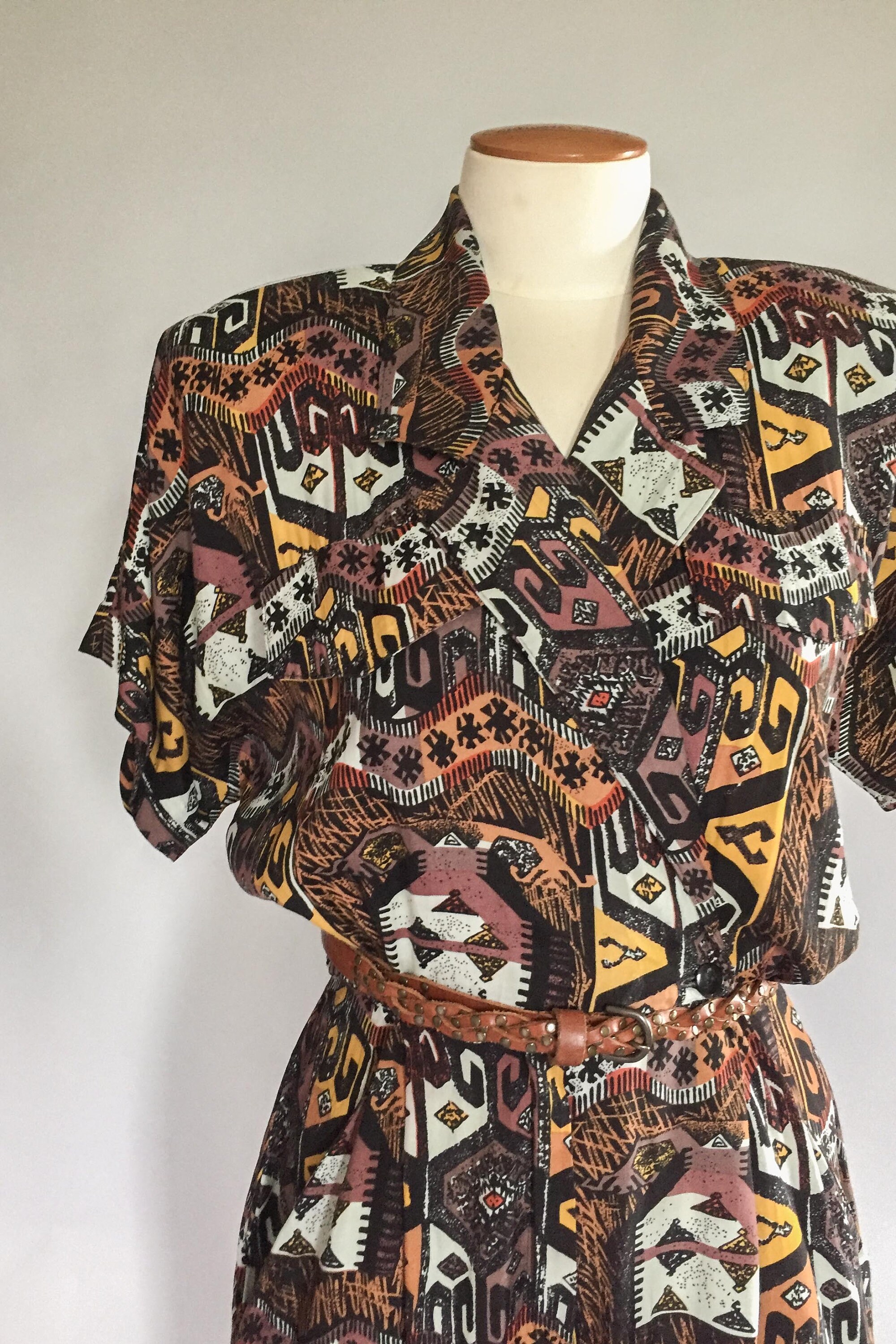 Vintage 1980s brown and black abstract print rayon short sleeved romper ...