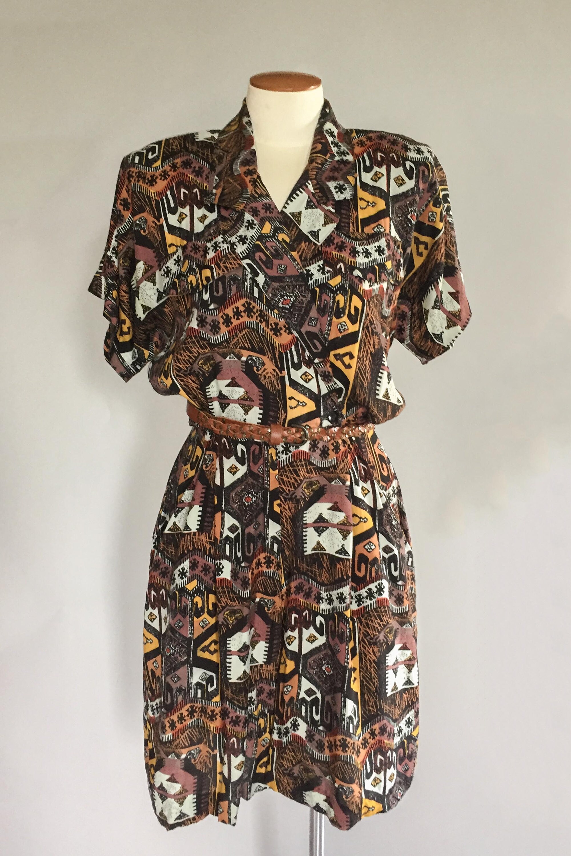 Vintage 1980s brown and black abstract print rayon short sleeved romper ...