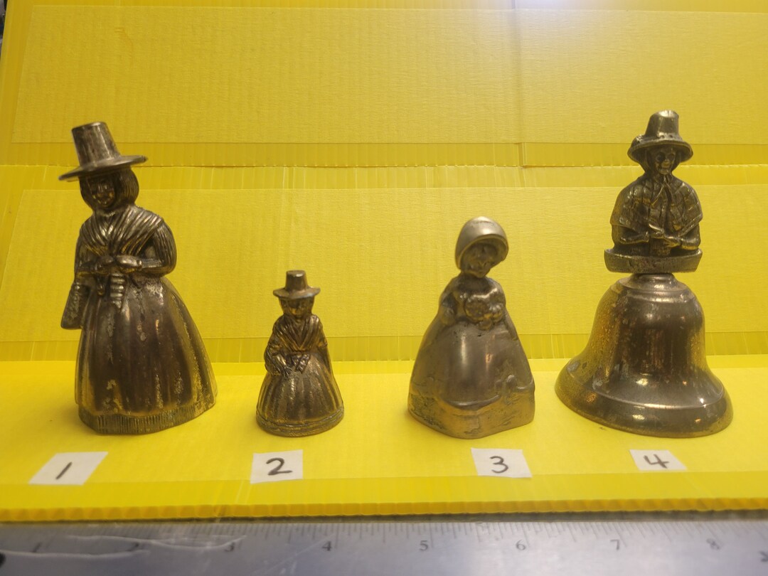 Nos. (1 & 3 SOLD), #2 is a 3 D Welsh Woman Brass Lady Bell, and No. 4 ...