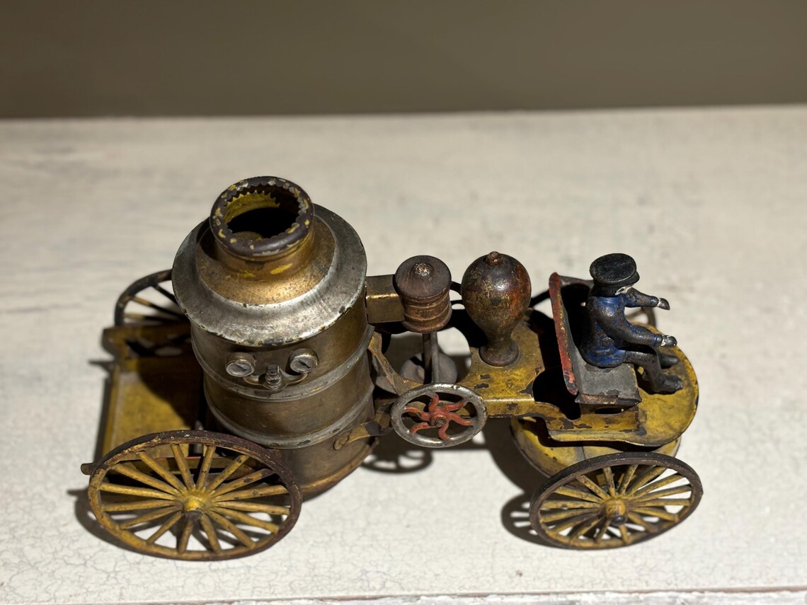 Early Pressed Steel and Cast Iron Fire Pumper Toy With Working ...