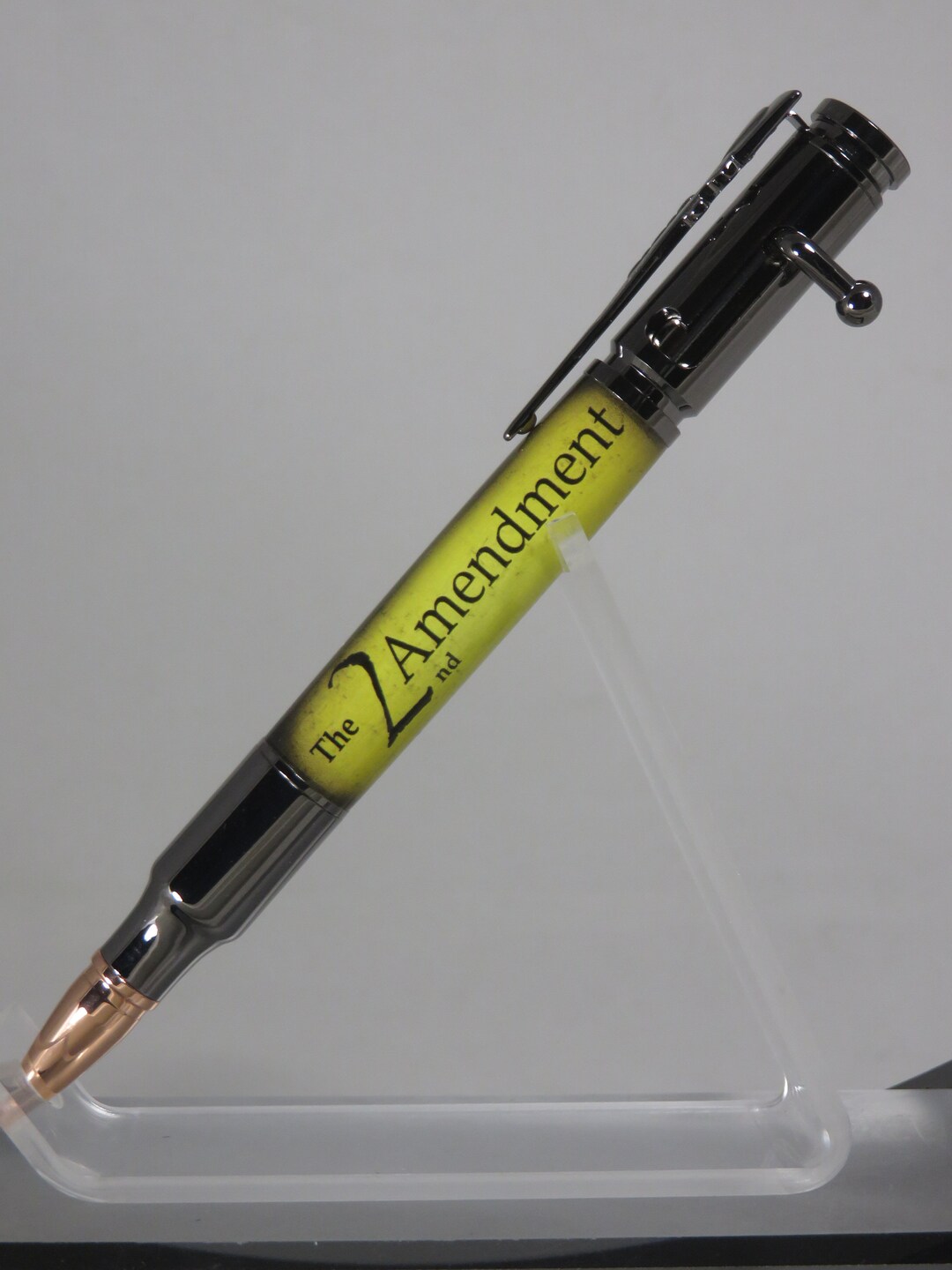Bolt Action Rifle Pen in Clear Acrylic Over Graphic of Parchment-like ...