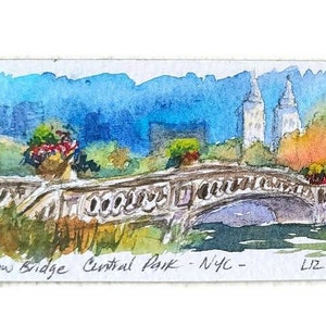 Central Park New York City. Bow Bridge With Skyscrapers on the ...