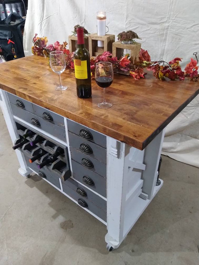 Farmhouse Kitchen Island With a Built in Wine Rack, and Casters, With ...