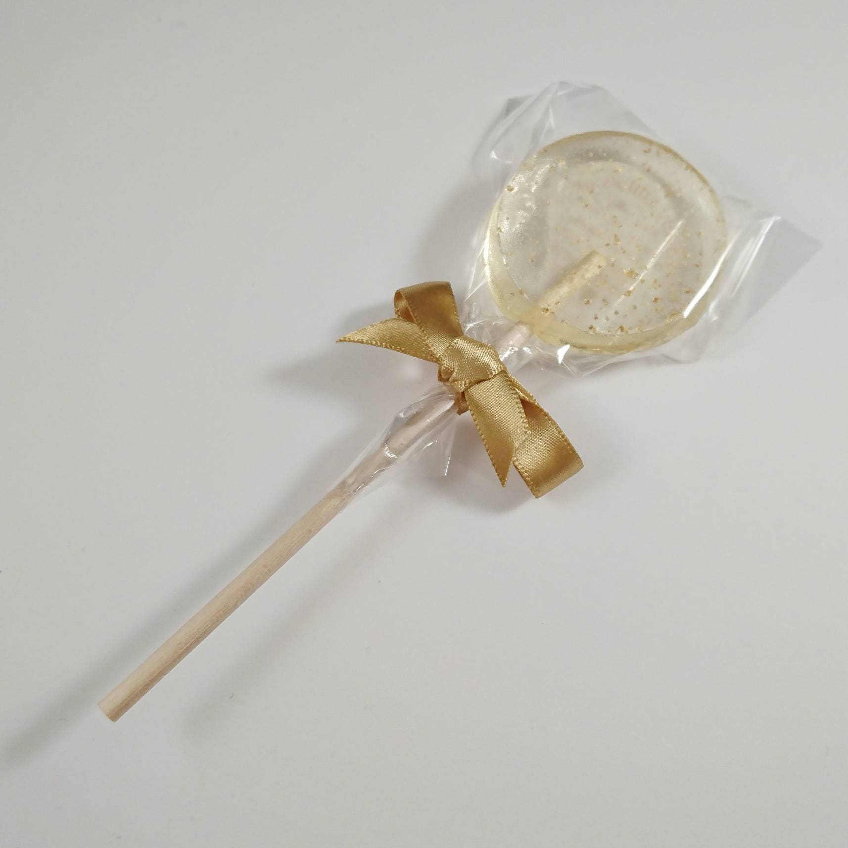 Golden Lollipops With Edible Gold Glitter and Satin Bows - Etsy UK
