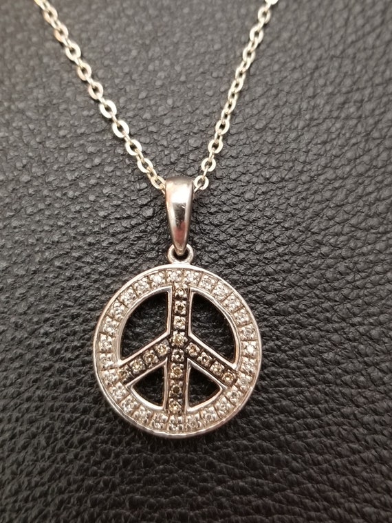 CP662 Diamonds in Peace Symbol in Sterling Silver and… - Gem