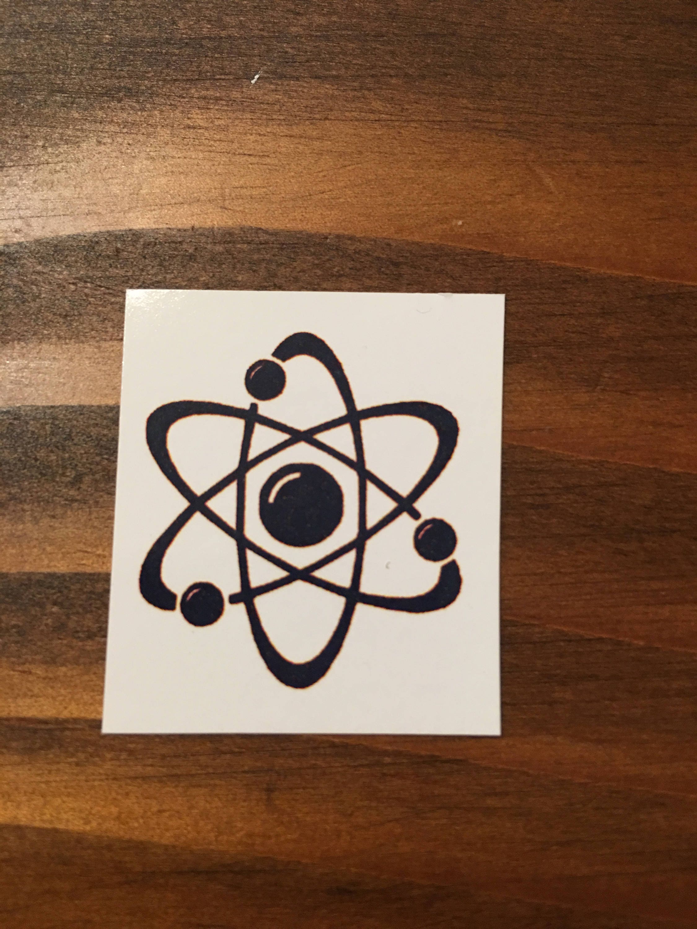 Neutron Symbol Tattoo