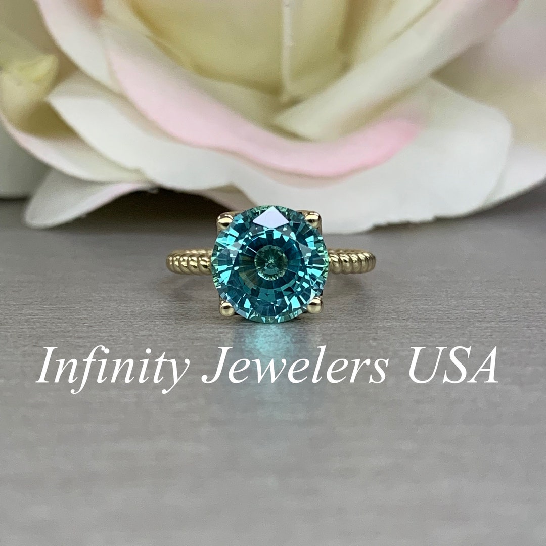 Round Blue Solitaire Engagement Ring Extra Facets for More Brilliance ...