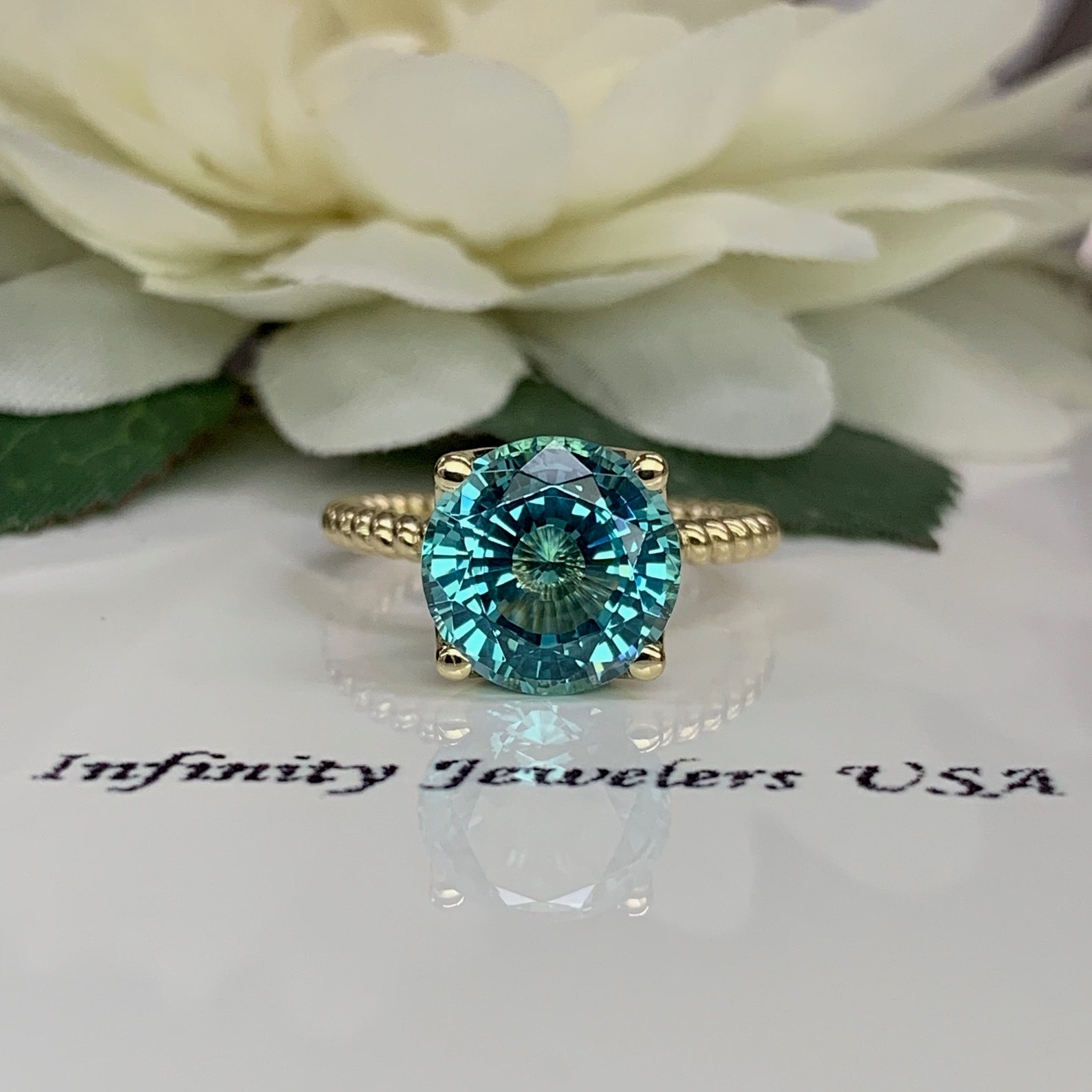 Round Blue Solitaire Engagement Ring Extra Facets for More Brilliance ...