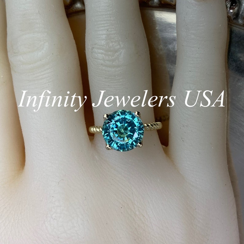 Round Blue solitaire Engagement Ring Extra Facets For More | Etsy