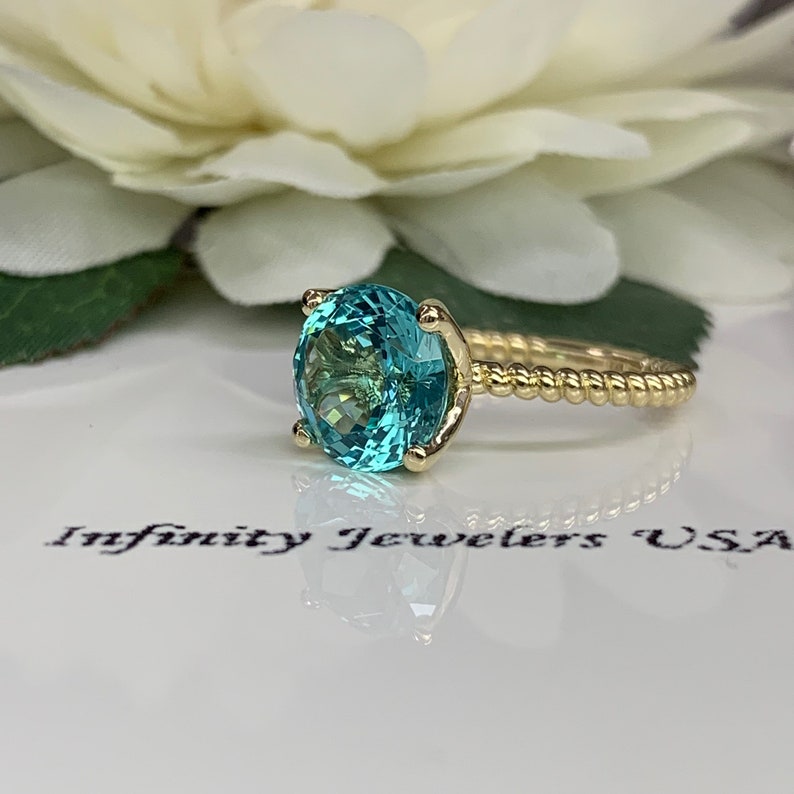 Round Blue solitaire Engagement Ring Extra Facets For More | Etsy