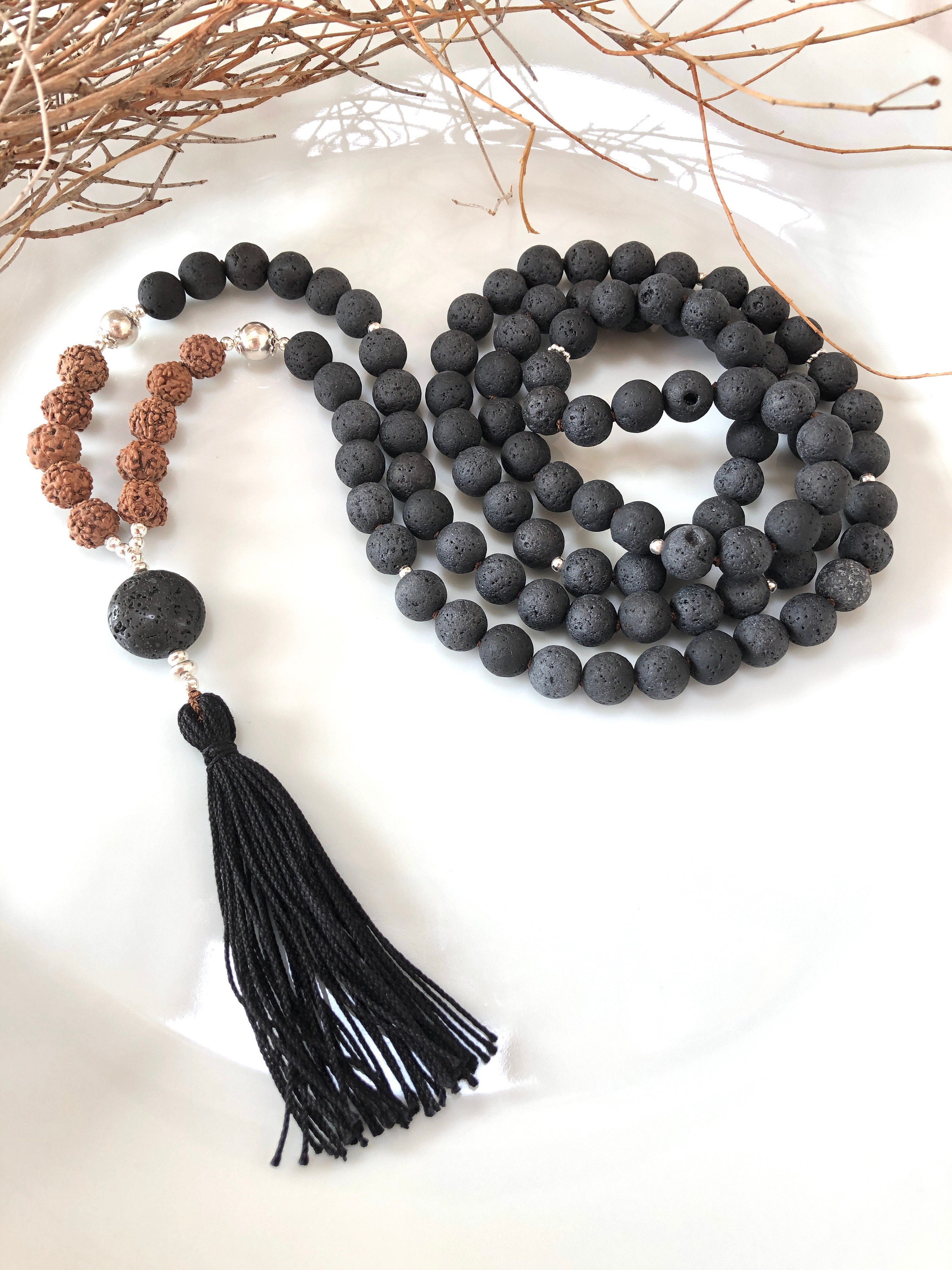 Powerful mala of lava and rudraksha, decorated with silver, final pearl ...