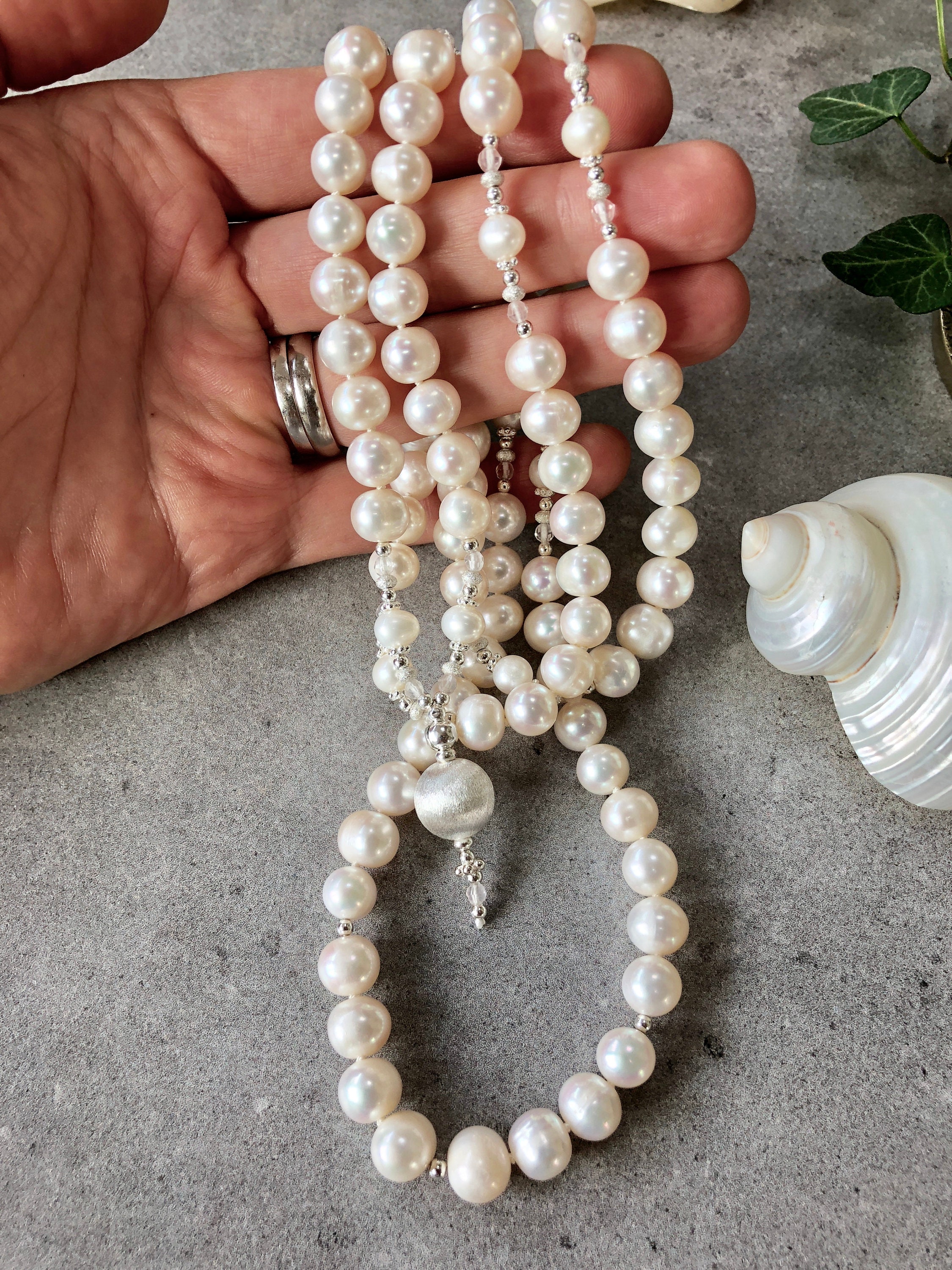 Long mala from 108 freshwater pearls decorated with silver (sterling)