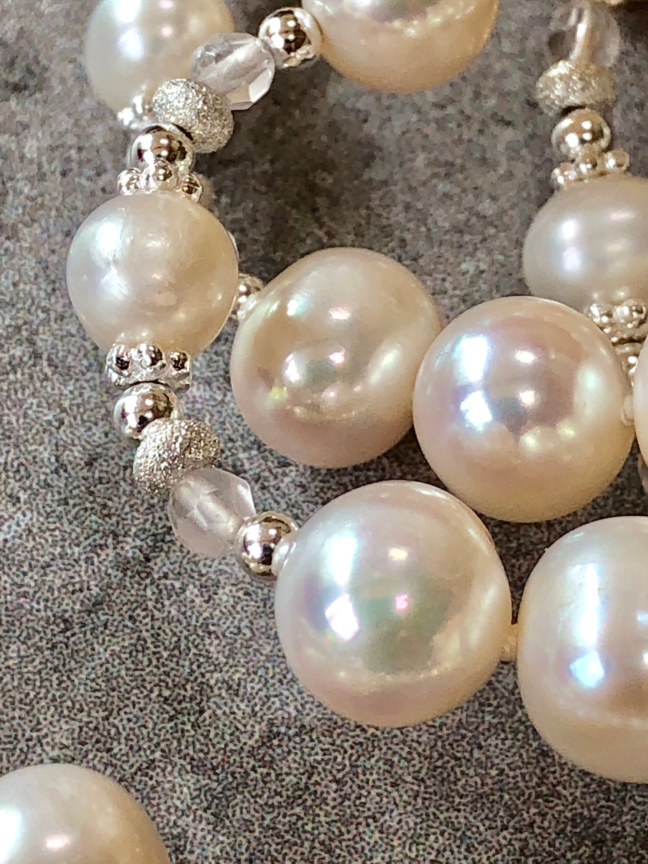 Long mala from 108 freshwater pearls decorated with silver (sterling)