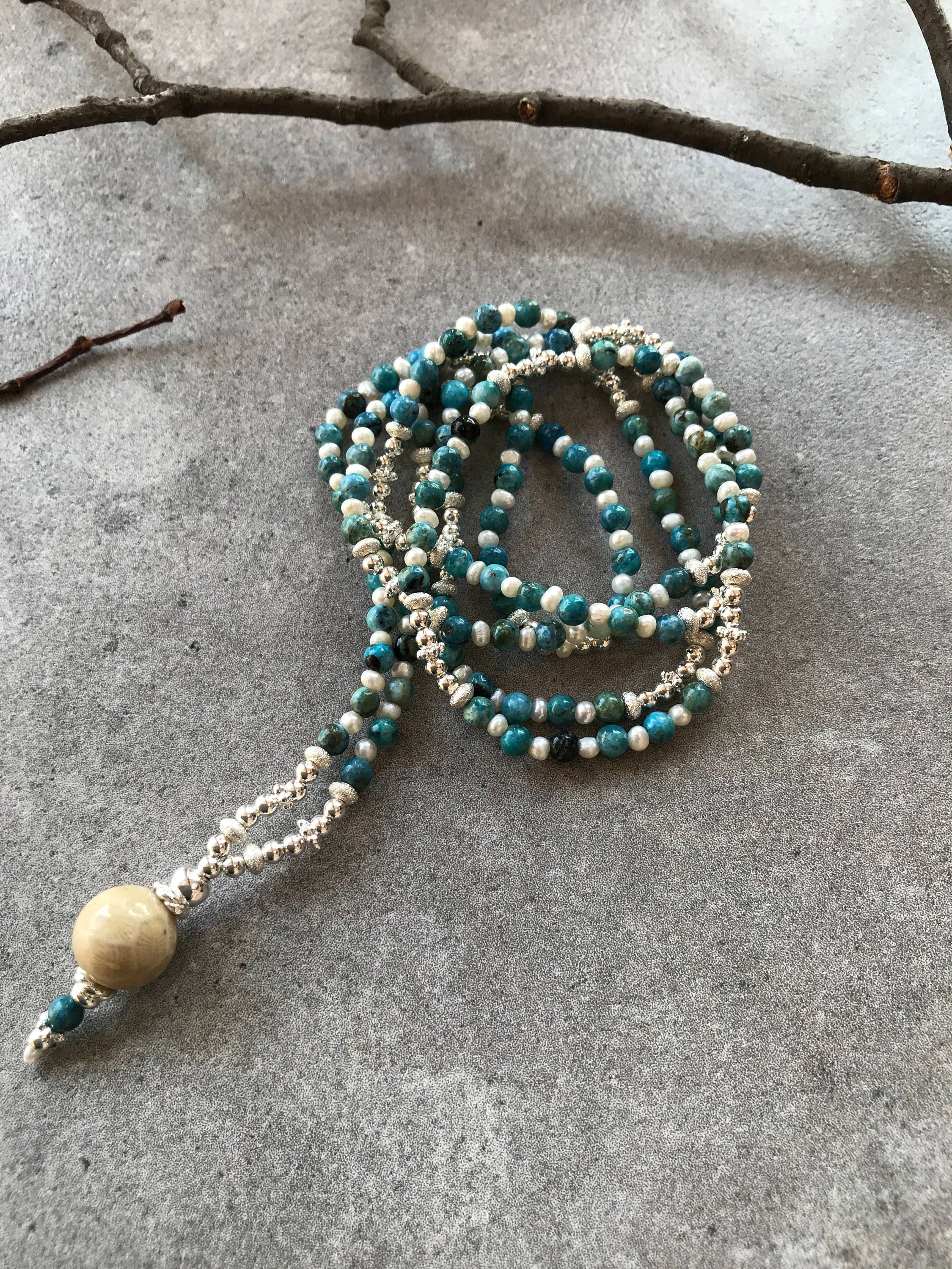 Petite mala made of opalith (blue), decorated with small freshwater ...