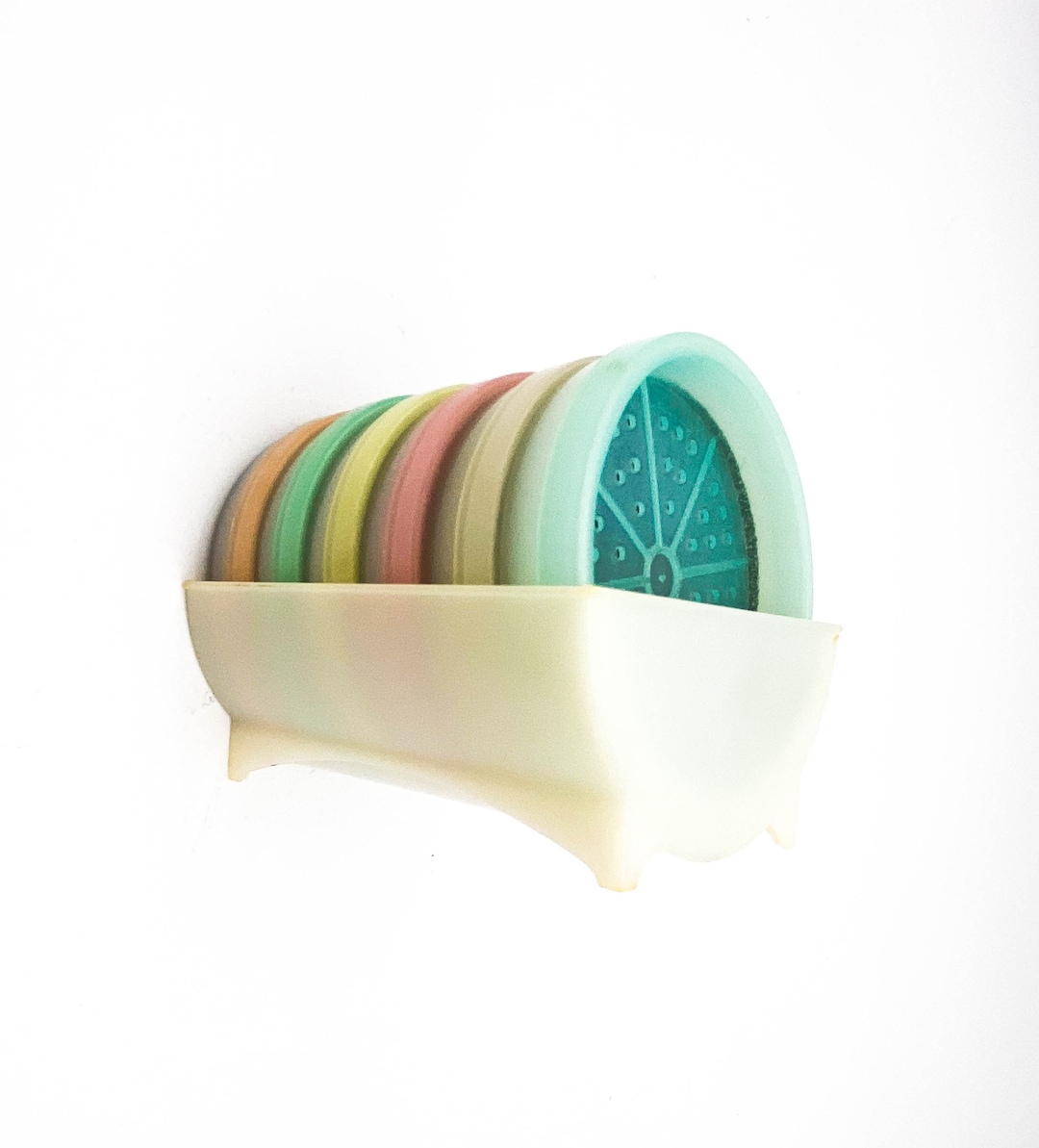 Fabulous Tupperware Wagon Wheel Colored Coasters in Caddy. Pastel ...