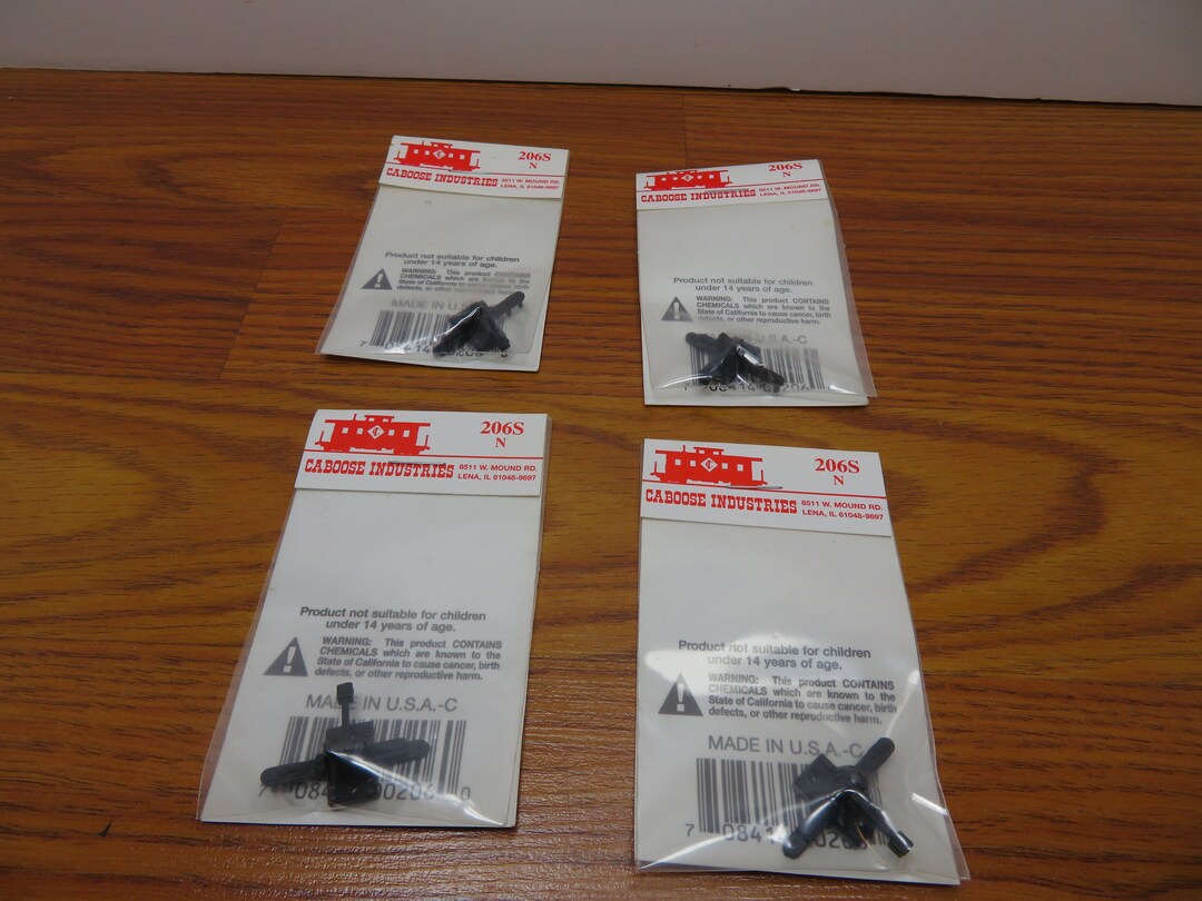 P 272 N Gauge Caboose Industries # 206S (4) Ground Throw Sprung With ...