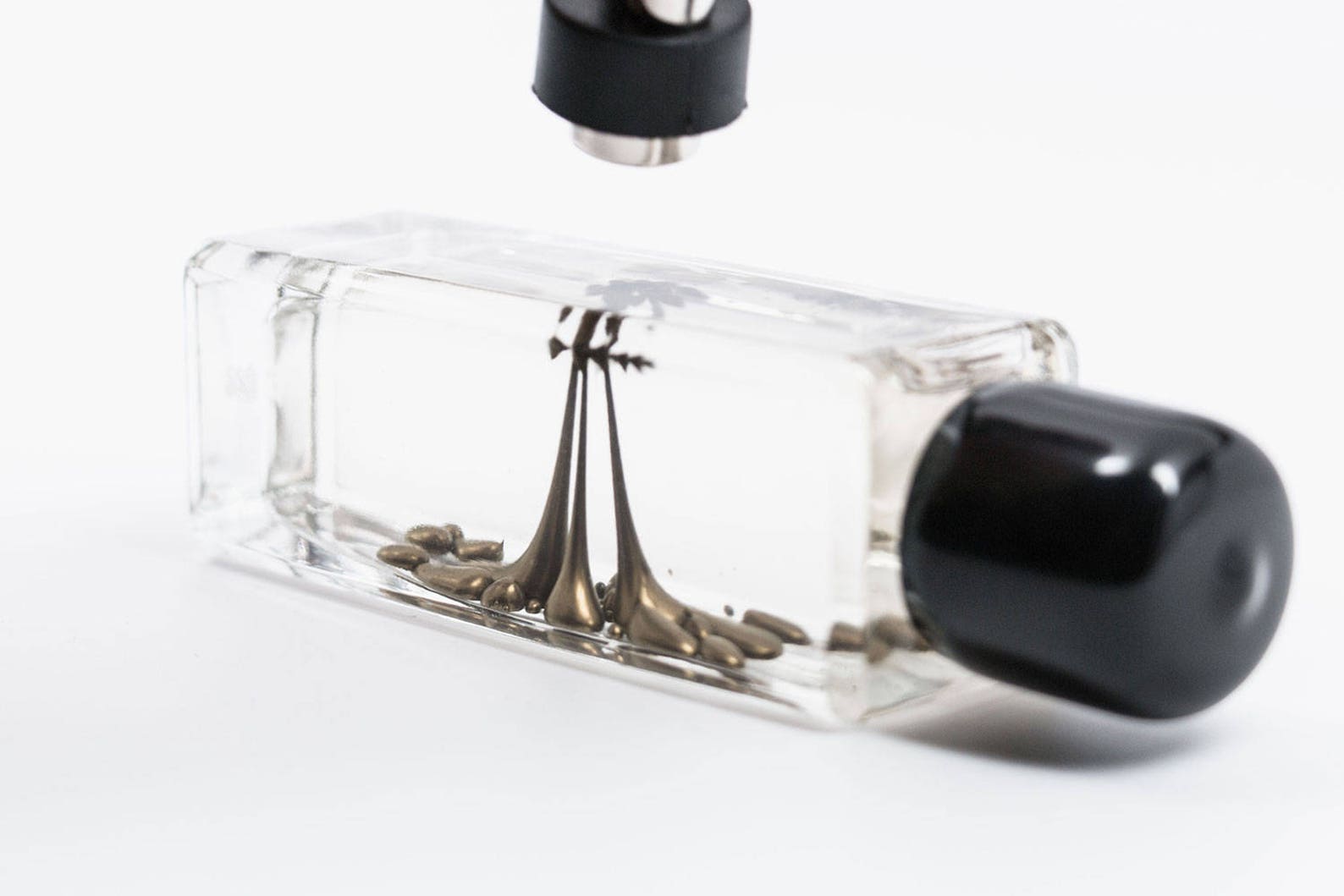 Ferrofluid | Motion Magnetic Liquid Bottle Display by Concept Zero - Etsy