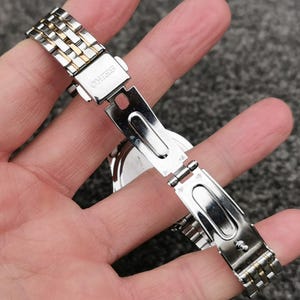 Seiko Quartz Watch, Crystal Bezel, Round Dial, Two-tone Stainless Steel ...