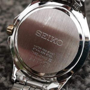 Seiko Quartz Watch, Crystal Bezel, Round Dial, Two-tone Stainless Steel ...