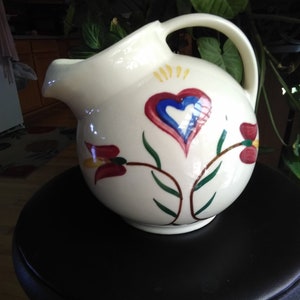 Shawnee Pottery Ball Shaped Pitcher With Their Pennsylvania Dutch ...