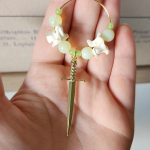 Uranium Glass Snake Vertebrae Sword Earrings - Etsy
