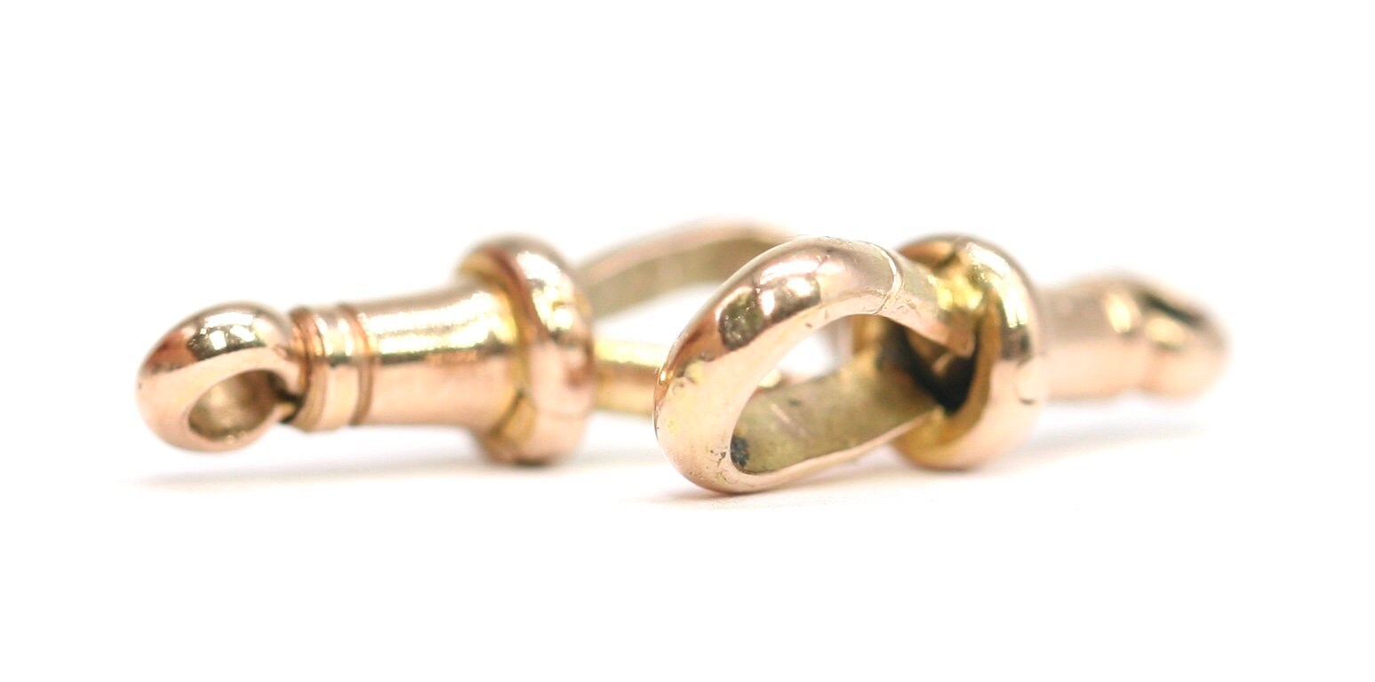 Superb matching pair of antique 9ct rose gold 19mm dog clips