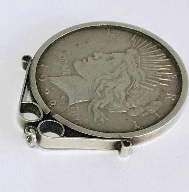 Stunning antique solid silver One Dollar pendant mount dated 1922