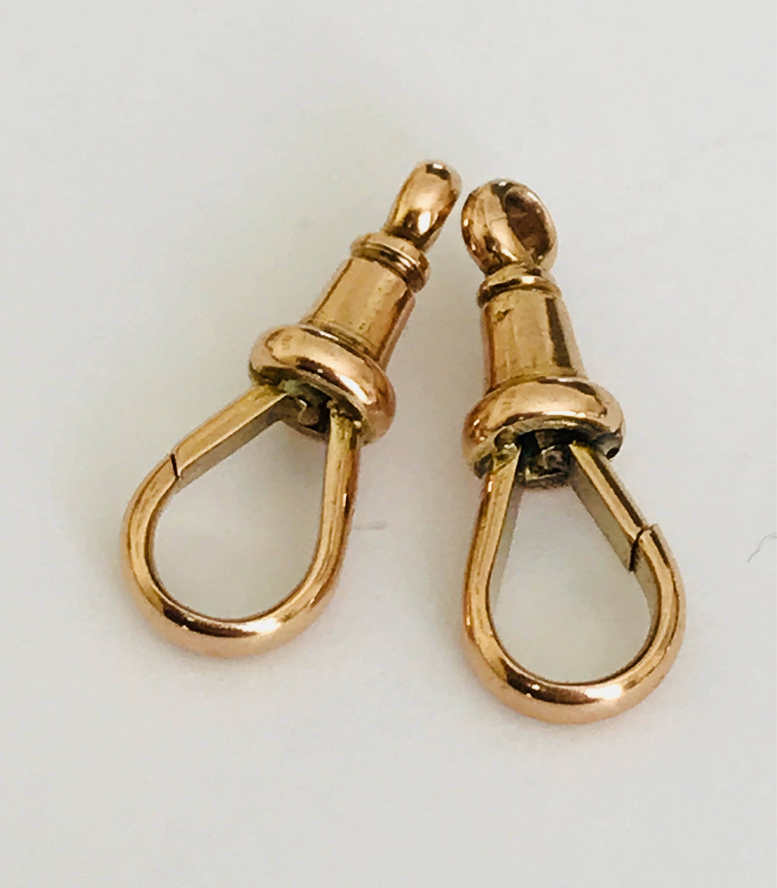 Superb matching pair of antique 9ct rose gold dog clips