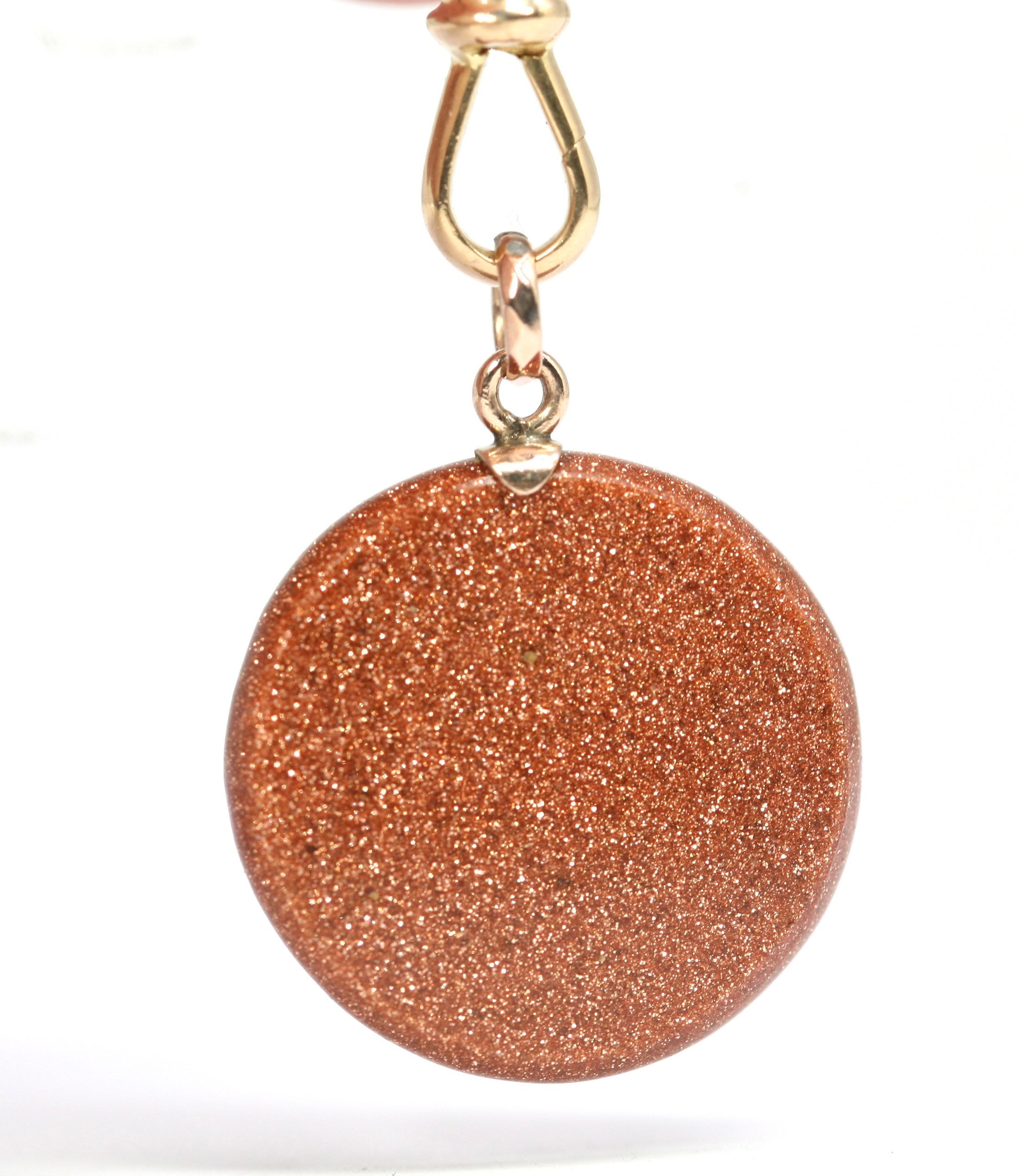 Antique 9ct gold Goldstone pendant