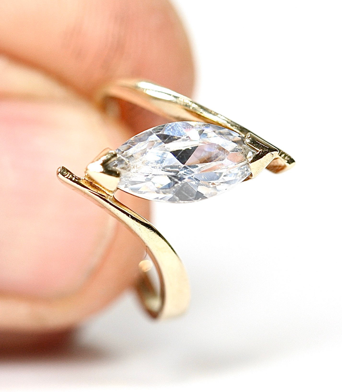 Sparkling vintage 9ct gold crossover ring with Marquise cut Cubic ...