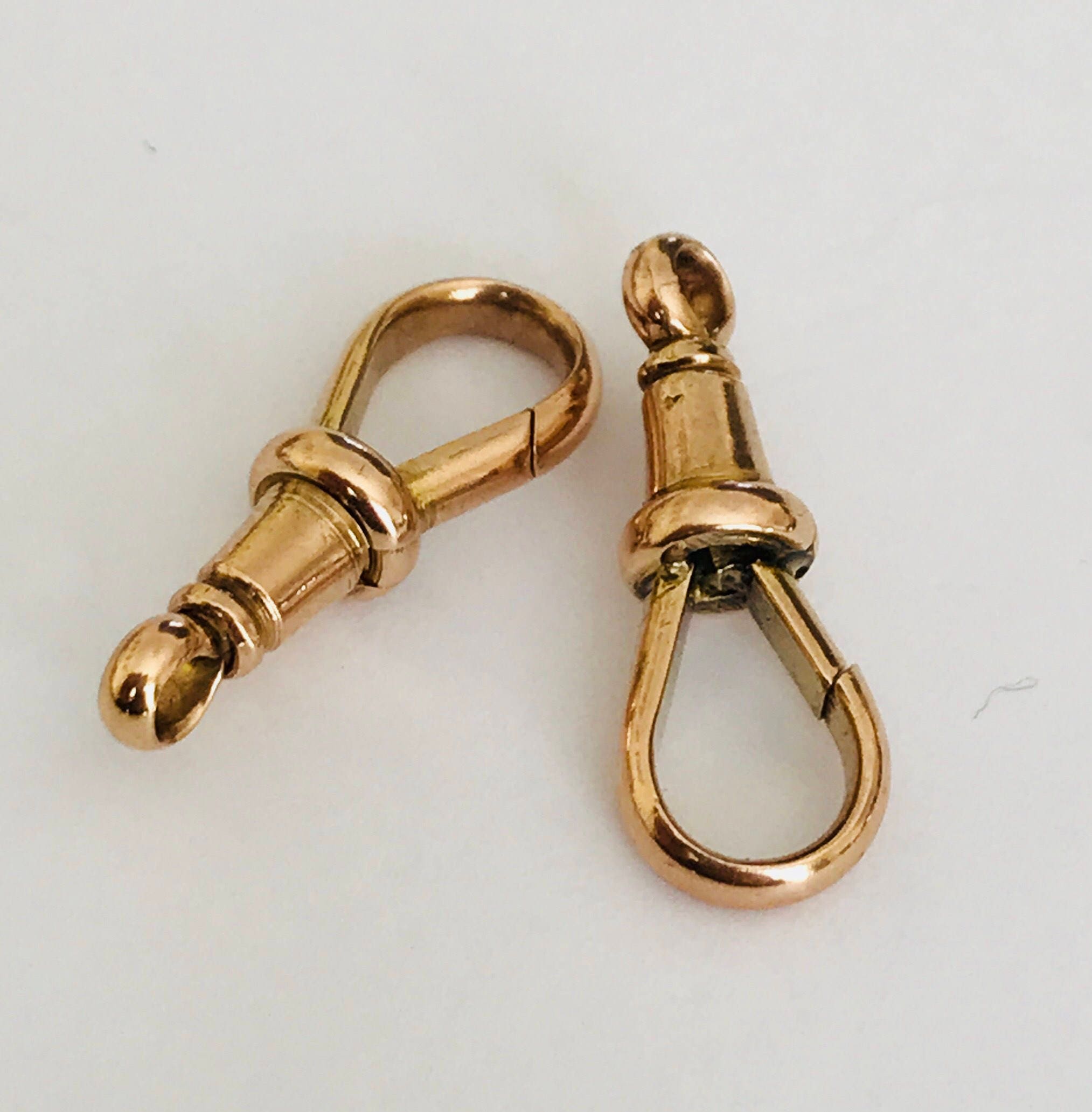 Superb matching pair of antique 9ct rose gold dog clips